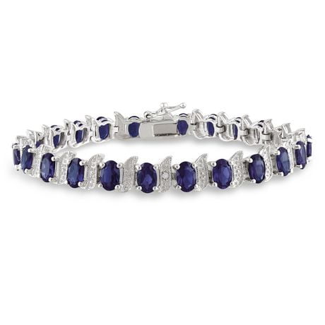 Click here for Tangelo 13-1/5 Carat T. G.W. Created Blue Sapphire... prices