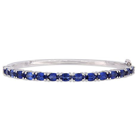 Click here for Tangelo 8-1/4 Carat T. G.W. Created Blue Sapphire... prices