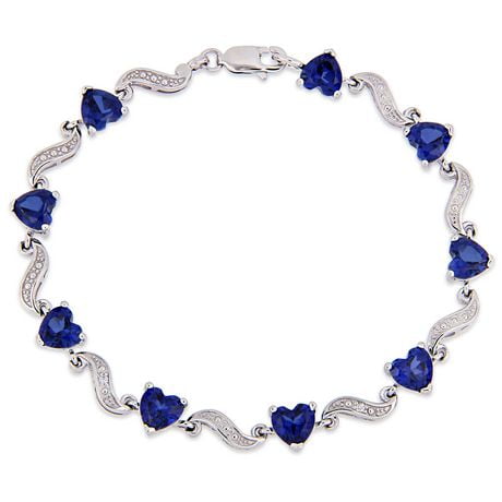 Click here for Tangelo 8-1/5 Carat T. G.W. Created Blue Sapphire... prices