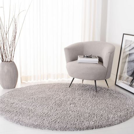 Click here for Safavieh Fontana Jamie Solid Plush Shag Area Rug G... prices