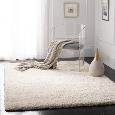 Click here for Safavieh California Solid Plush Shag Area Rug Ivor... prices