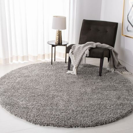 Click here for Safavieh California Solid Plush Shag Area Rug Silv... prices