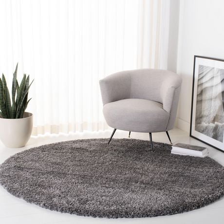 Click here for Safavieh Fontana Jamie Solid Plush Shag Area Rug S... prices