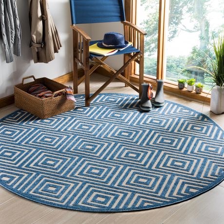Click here for Safavieh Cottage Laraine Geometric Outdoor Area Ru... prices