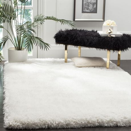 Click here for Safavieh Luxe Paxton Solid Plush Shag Area Rug  Iv... prices