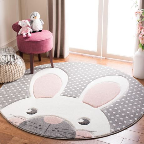 Click here for Safavieh Carousel Kids Laidley Happy Bunny Area Ru... prices