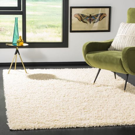 Click here for Safavieh Athens Solid Plush Shag Area Rug Ivory 67... prices