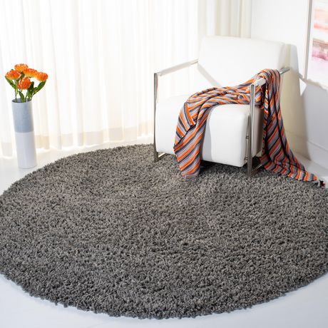 Click here for Safavieh August Sophia Solid Plush Shag Area Rug G... prices