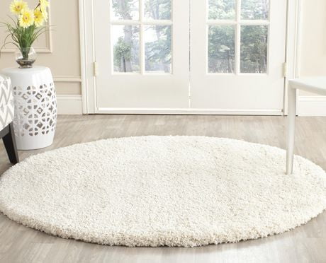 Click here for Safavieh Milan Harlow Solid Shag Area Rug Ivory 51... prices