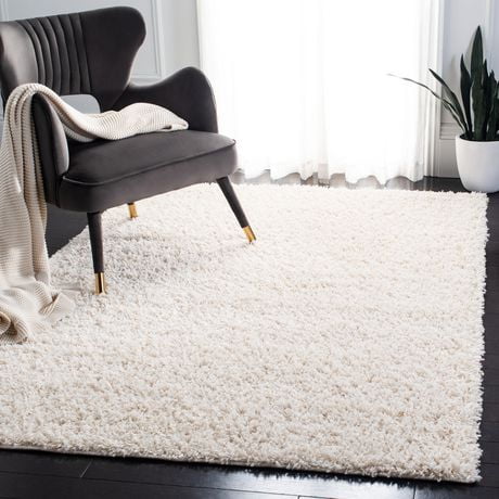 Click here for Safavieh Venus Elijah Solid Plush Shag Area Rug Iv... prices