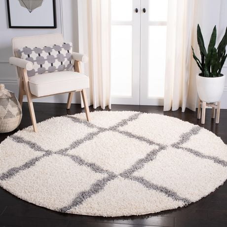 Click here for Safavieh Dallas Logan Geometric Shag Area Rug Ivor... prices
