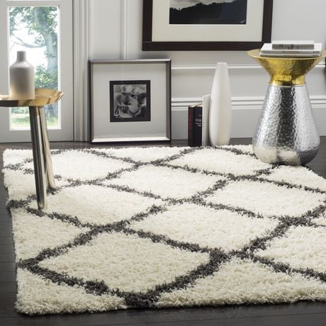 Click here for Safavieh Dallas Logan Geometric Shag Area Rug Ivor... prices