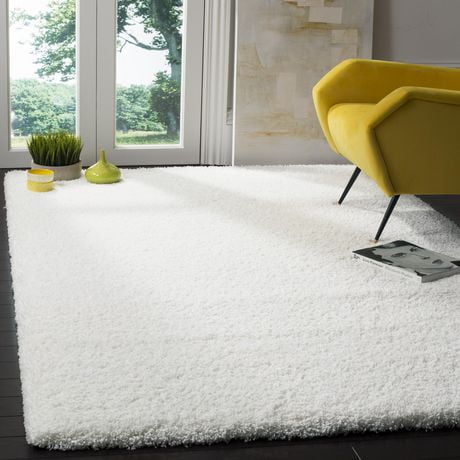 Click here for Safavieh California Solid Plush Shag Area Rug Whit... prices