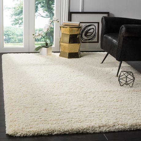 Click here for Safavieh California Solid Plush Shag Area Rug Ivor... prices